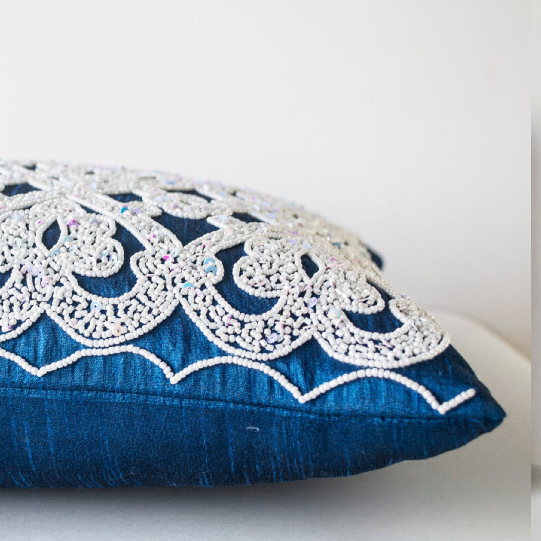 Shop for handmade blue silk throw pillow with white sequin embroidery