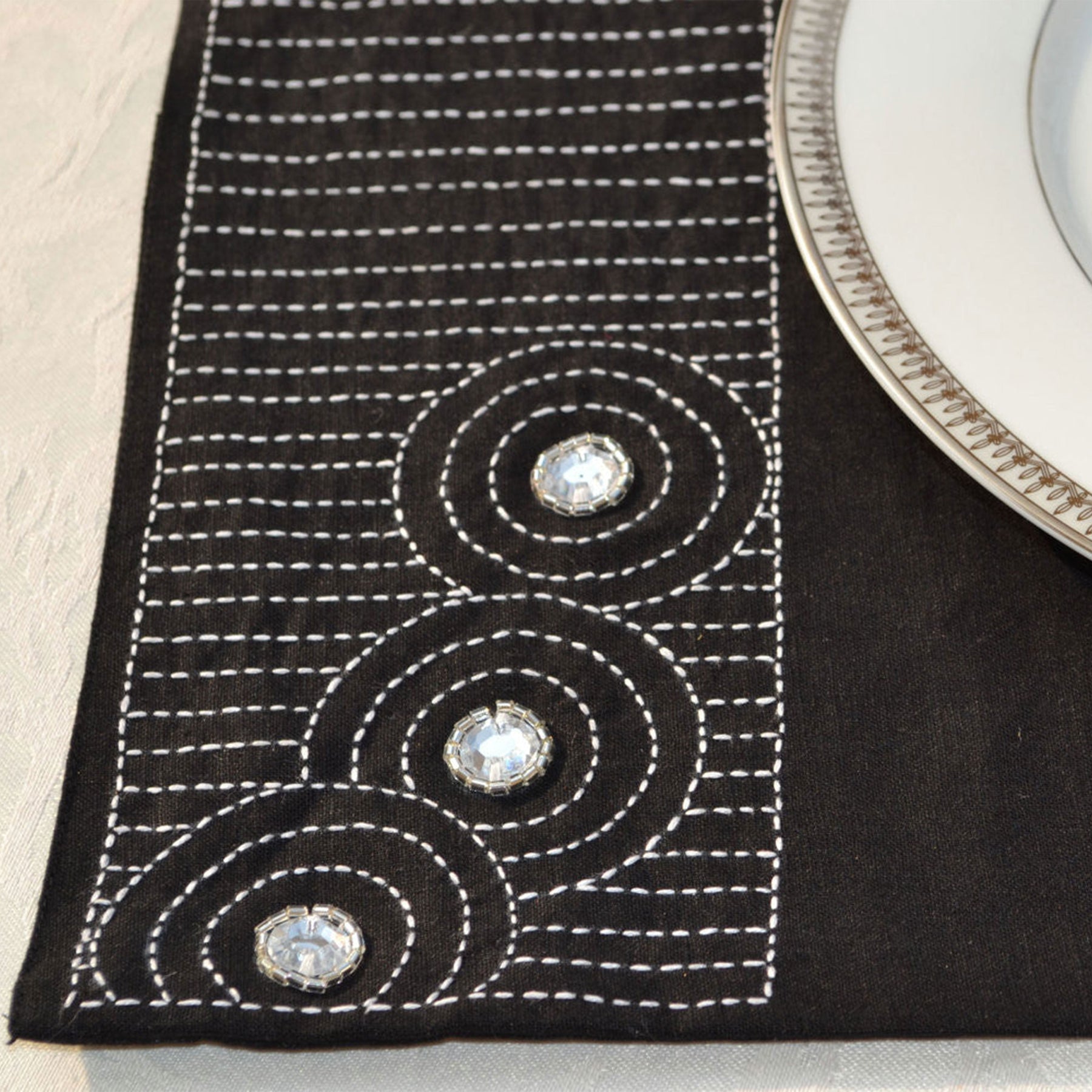 Shop online for black linen hand embroidered place mats.
