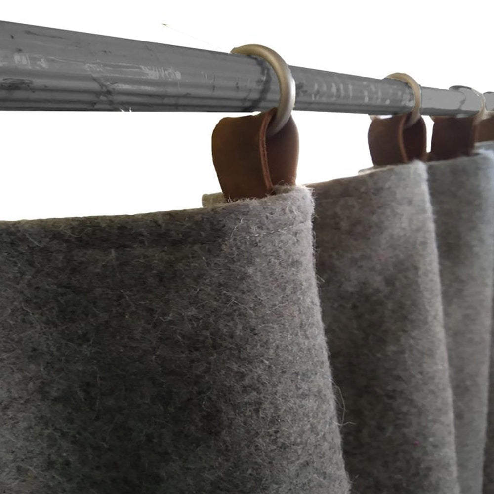 Custom made wool felt curtains that cut draft, sound and light