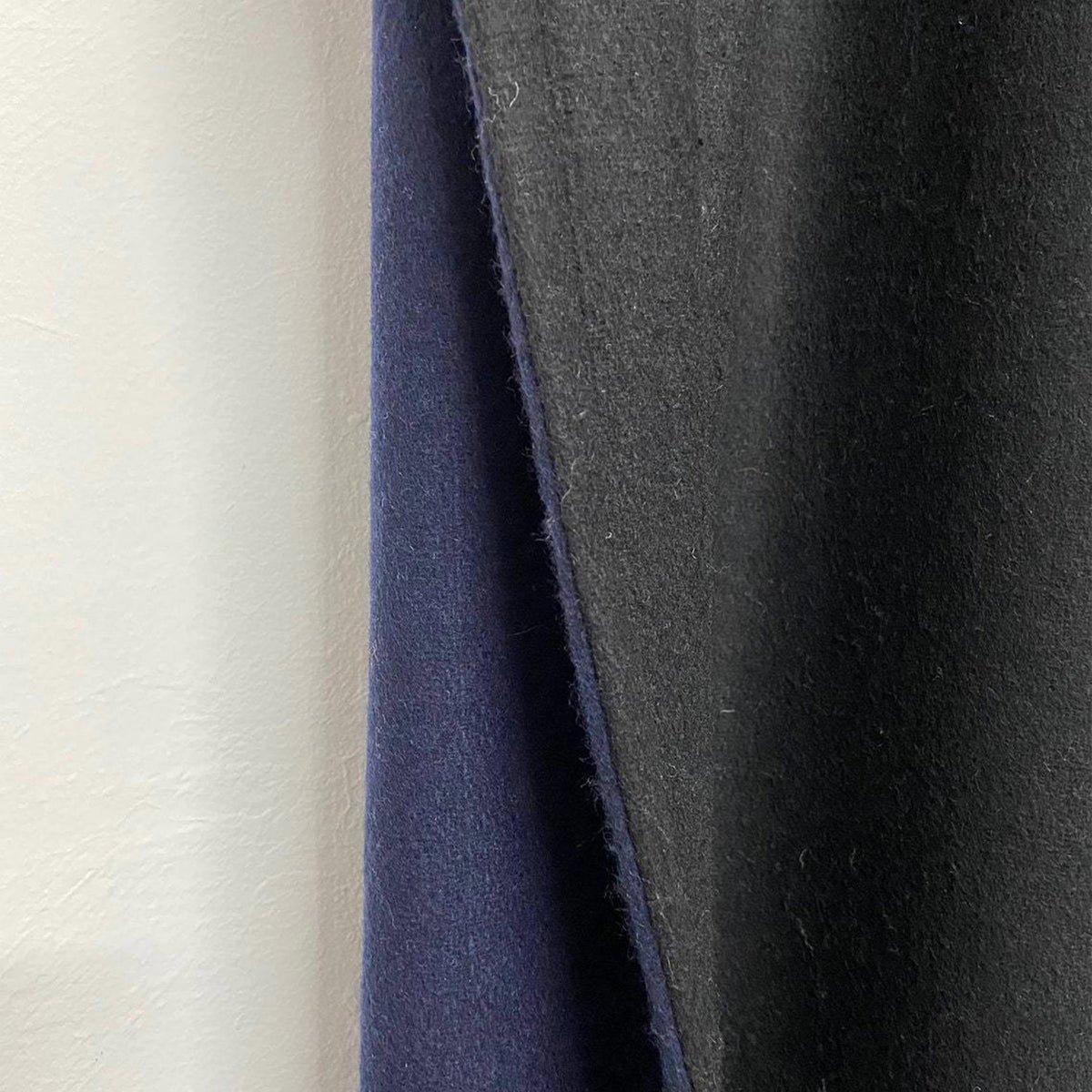 Custom drapes in wool felt that cut draft, block noise and cut light